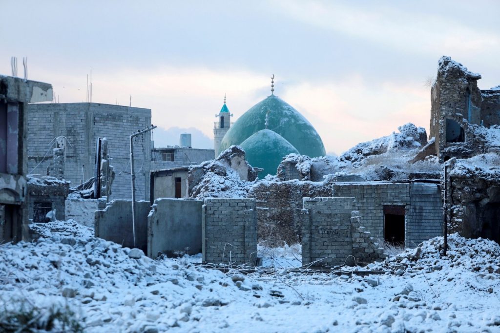 In Pictures: Snow Covers Baghdad for the First Time Since 2008 ...